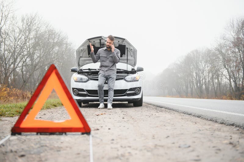 Sad Man on the Road Next To the Broken Car Stock Photo - Image of ...