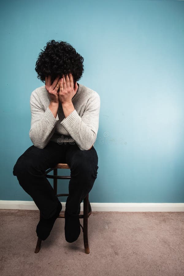 9+ Sad man sitting chair Free Stock Photos - StockFreeImages