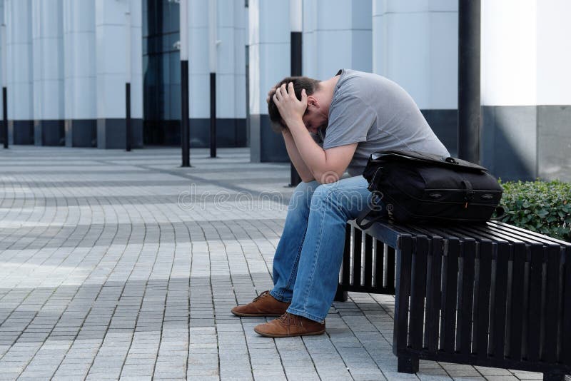 Sad Man Sitting in Front of Office Building Stock Image - Image of ...