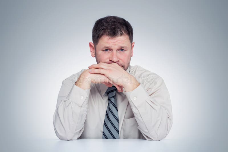 Sad Man Sitting at the Table, Concept Fear Stock Image - Image of ...
