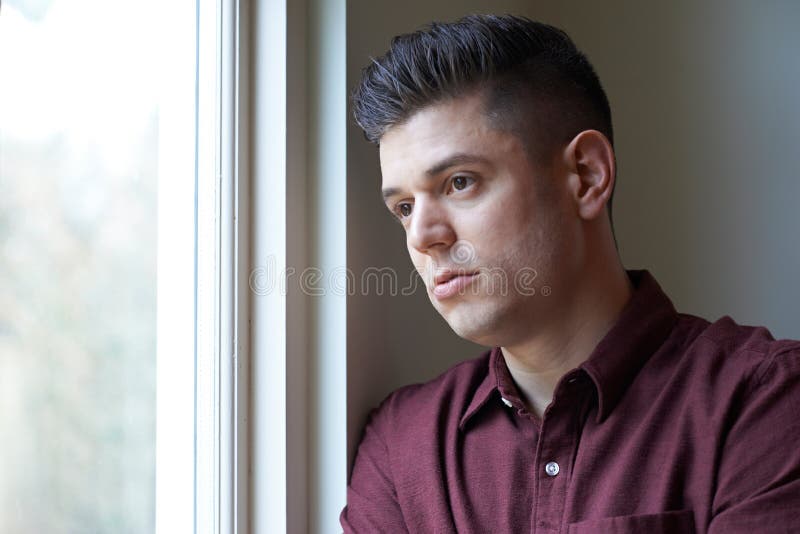 Sad Man Suffering from Depression Looking Out of Window Stock Image ...