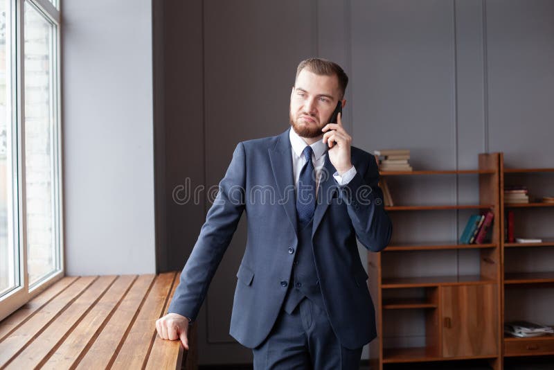 Sad Man Talking on Smart Phone Stock Photo - Image of entrepreneur ...