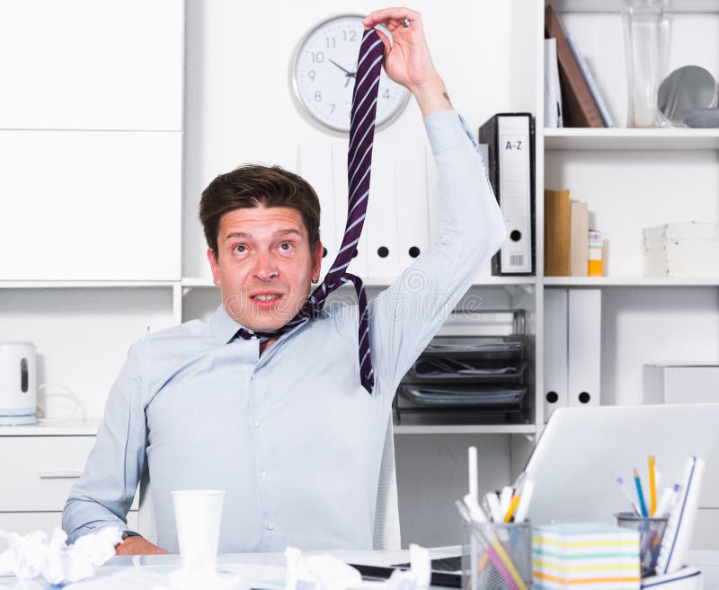 Sad man tired of working stock image. Image of computer - 93819813
