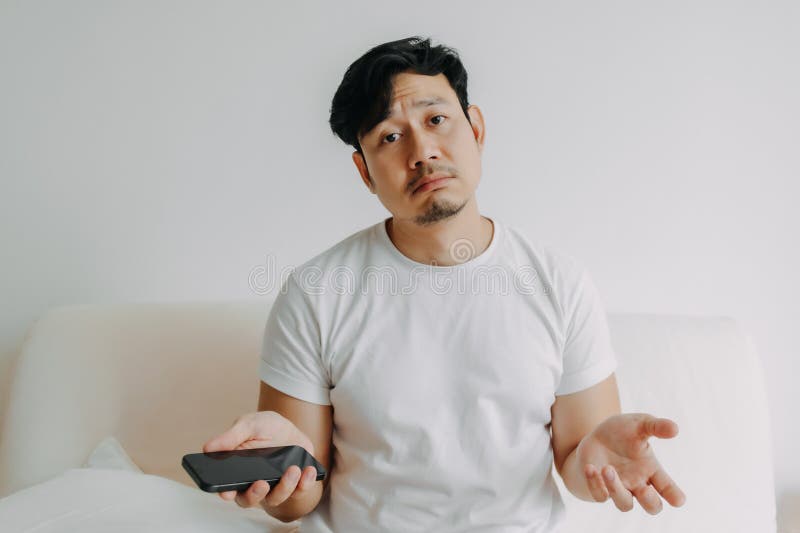 Sad Man Trying To Call and Connect To Someone but No Answer. Stock ...