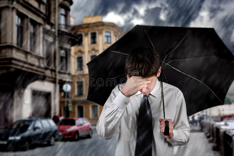 Sad Man Under The Rain Stock Image - Image: 35592571