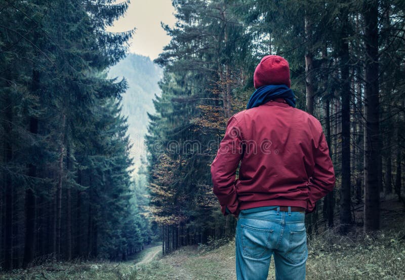 Sad man walking by forest stock photo. Image of color - 46522480