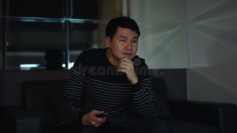 Sad Man Watching Television and Crying on Sofa at Night Stock Footage ...