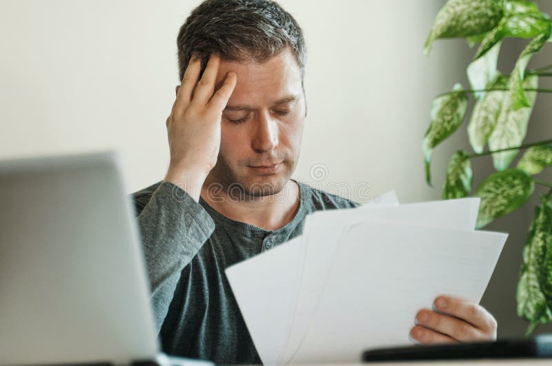 Sad Man Working with Papers Stock Photo - Image of depression, crisis ...