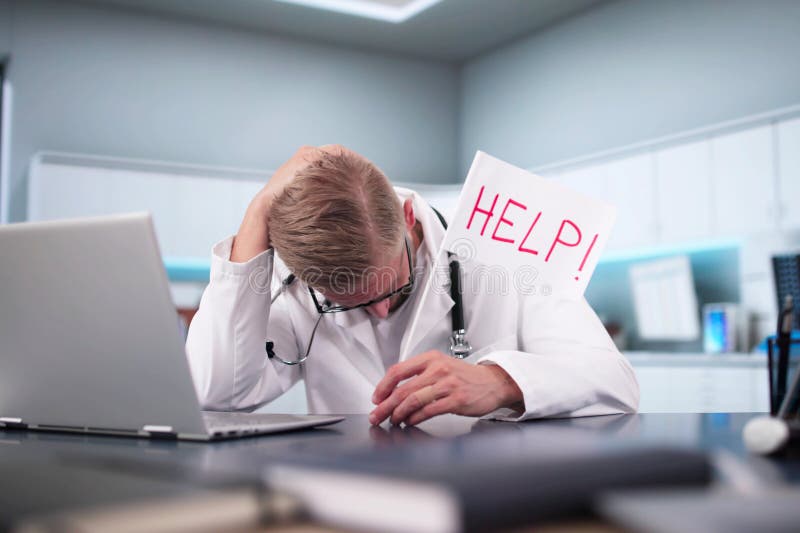 Sad Medical Doctor in Office with Workload Stock Photo - Image of help ...