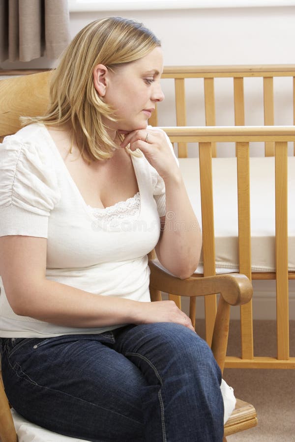 Sad Mother Sitting in Empty Nursery Stock Image - Image of depressed ...