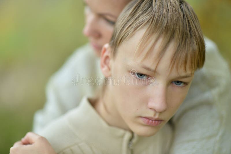 Sad mother with a son stock photo. Image of portrait - 44346344