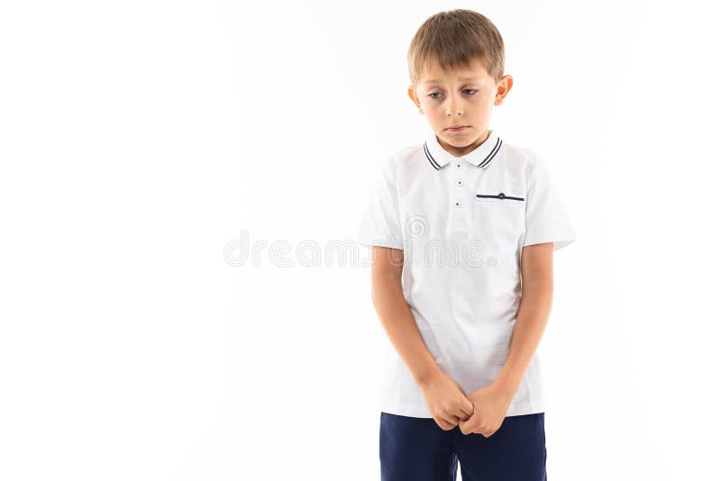 Sad Offended Boy with Bangs in a White T-shirt on a White Background ...