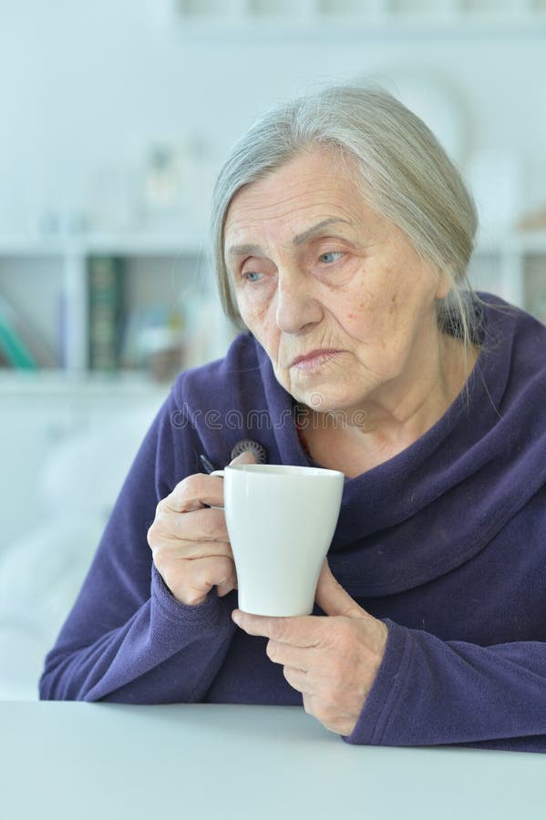 Sad Old Woman with Headache Drinking Tea Stock Photo - Image of senior ...