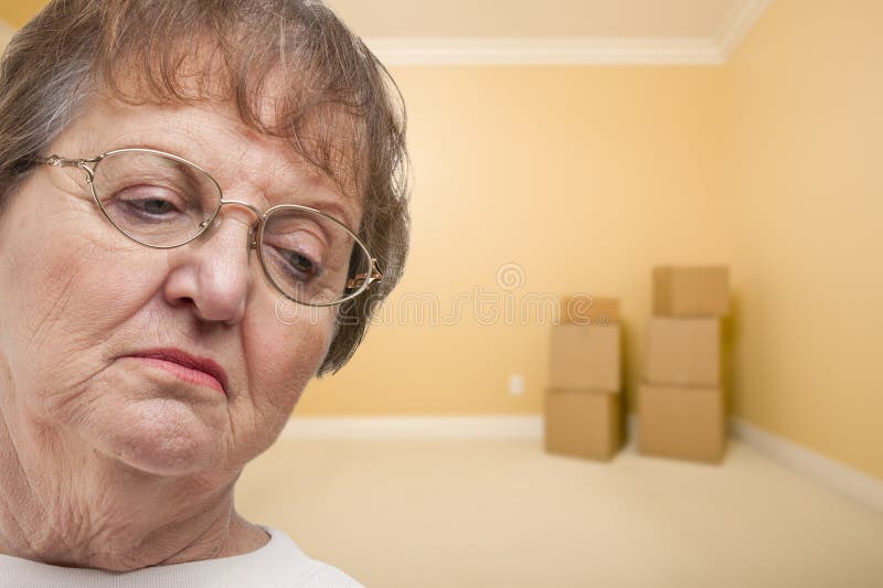 Sad Older Woman Empty Room Boxes Stock Photos - Free & Royalty-Free ...
