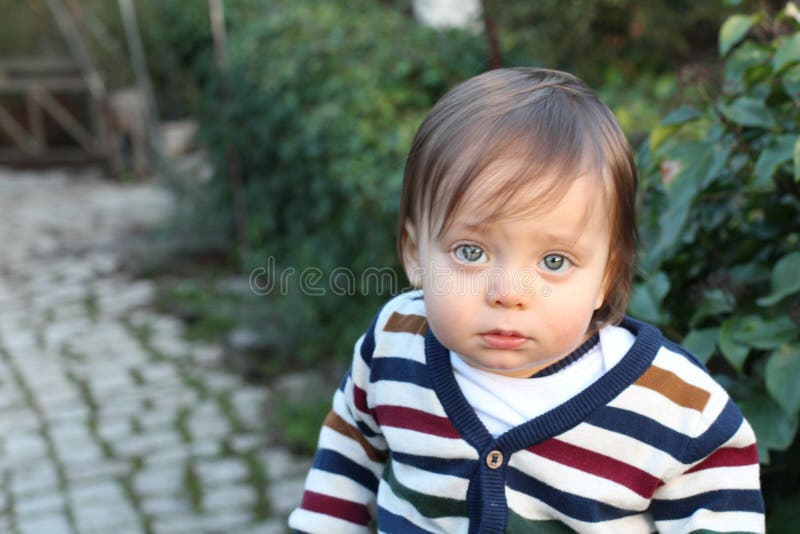 Sad One Year Old Baby Looking at Camera Stock Photo - Image of camera ...