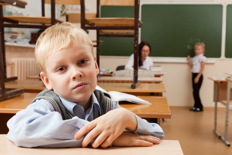 Sad schoolboy in classroom stock photo. Image of classroom - 45979736 Sad schoolboy in classroom stock photo. Image of classroom - 45979736