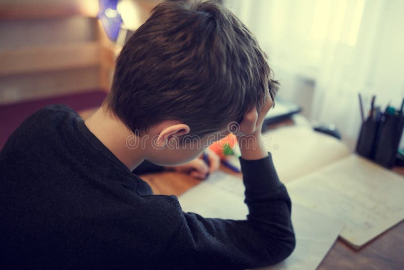 Sad Schoolboy Doing Homework Stock Image - Image of sadness, punishment ...