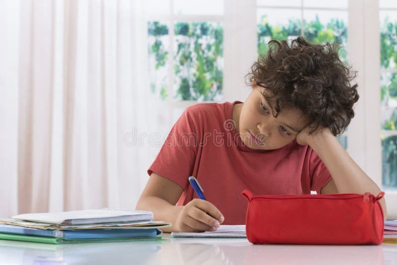 Sad Schoolboy Doing Homework Stock Image - Image of child, bored: 62218539