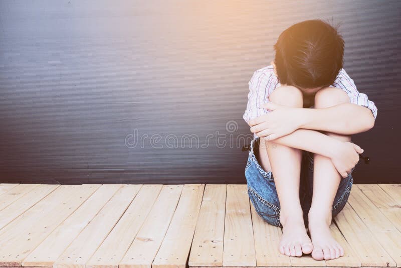 Sad sitting Asian boy stock photo. Image of tear, asian - 86698792