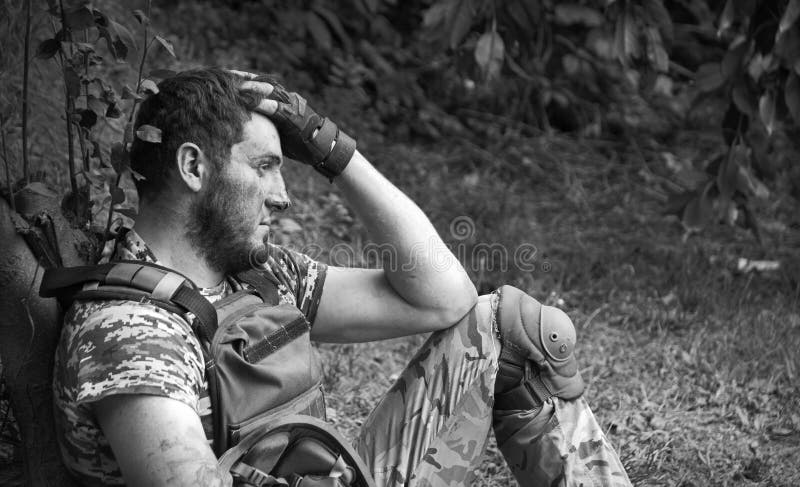 Sad Soldier Sits on the Ground Stock Photo - Image of guard, army ...