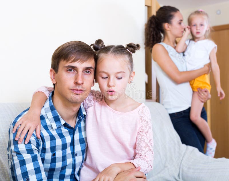 Sad Spouses with Two Daughters Stock Photo - Image of frustrated ...