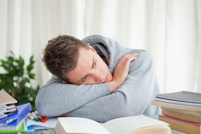Sad student stock photo. Image of exhausted, bored, books - 25334784