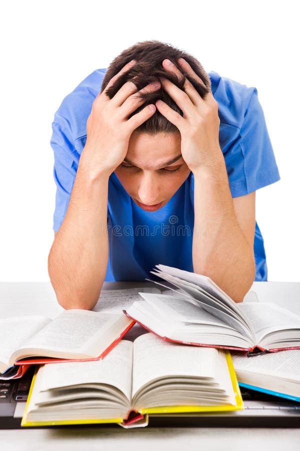 Sad Student with a Books stock photo. Image of exam - 164136070