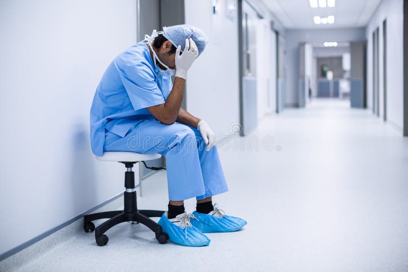 Sad Surgeon Sitting on a Chair Stock Image - Image of exhausted ...