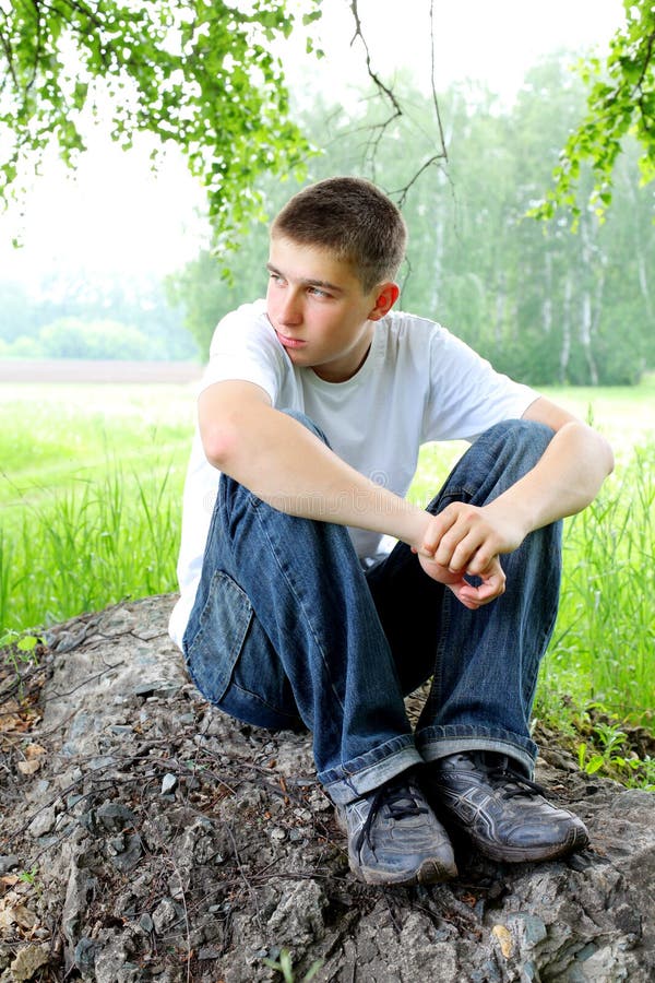 Sad teenager stock photo. Image of behavior, alone, handsome - 19900906