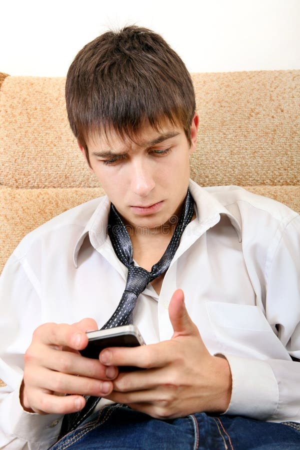 Sad Teenager with Cellphone Stock Image - Image of annoyed, failure ...