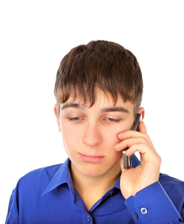 Sad Teenager with Phone stock image. Image of confused - 59046039