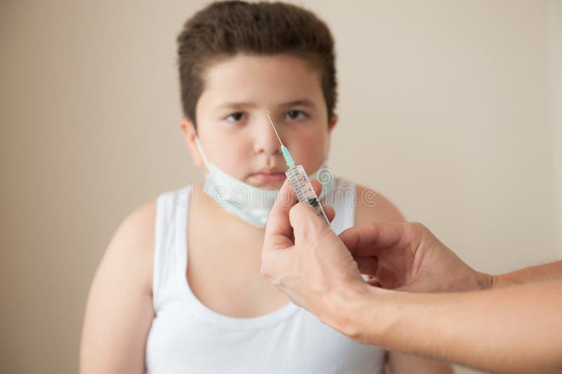 Fear of Injections, a Child with a Nurse. the Girl in the Treatment ...