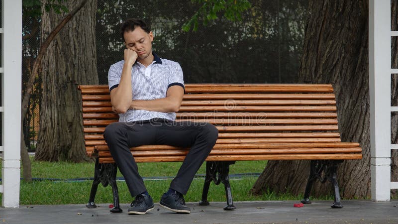 Sad or Tired Man Alone on Bench Stock Image - Image of male, depressed ...