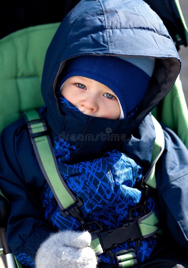 Sad Toddler in a Stroller on Cold Winter Day Stock Image - Image of ...