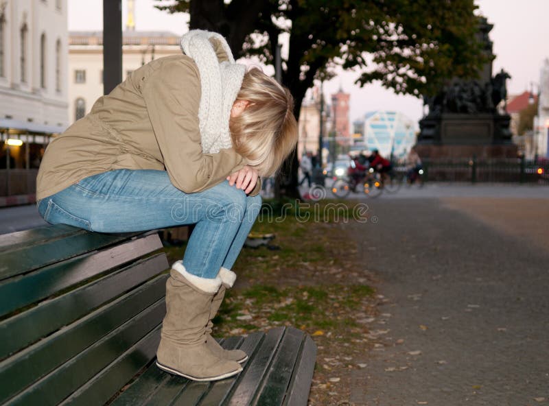 Sad woman on a bench stock photo. Image of jobless, beautiful - 22020600
