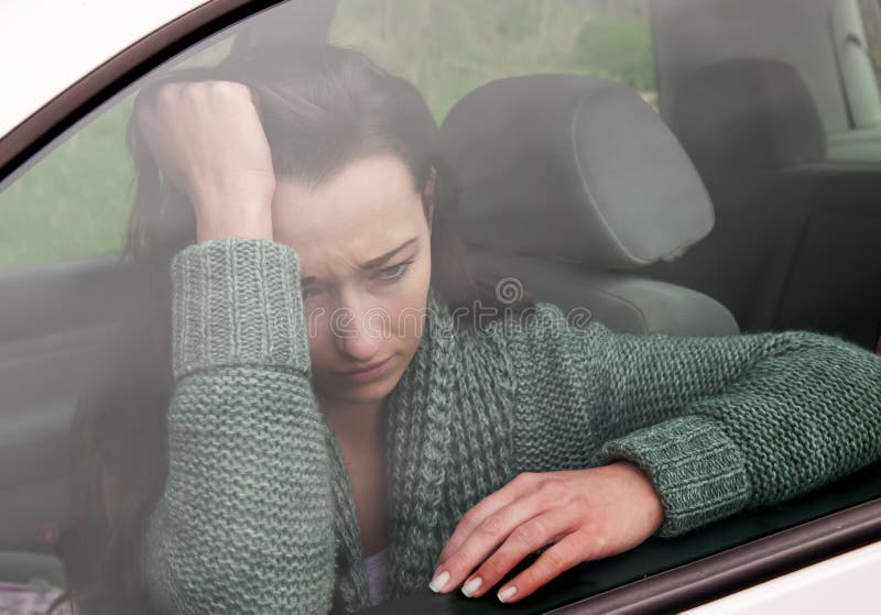 Sad woman in the car stock photo. Image of travel, beauty - 25049164