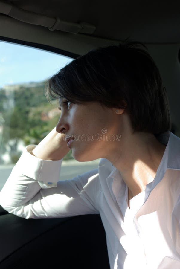 Sad woman in car stock photo. Image of hair, destination - 37565412