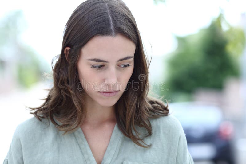 Sad Woman Complaining Looking Down in the Street Stock Photo - Image of ...