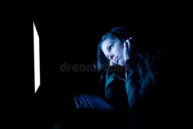Sad woman on computer stock photo. Image of seriously - 8505724
