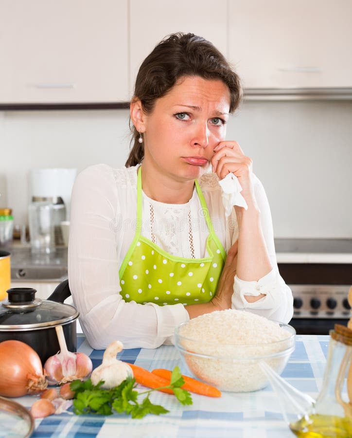 Sad Woman Cooking Rice Kitchen Stock Photos - Free & Royalty-Free Stock ...