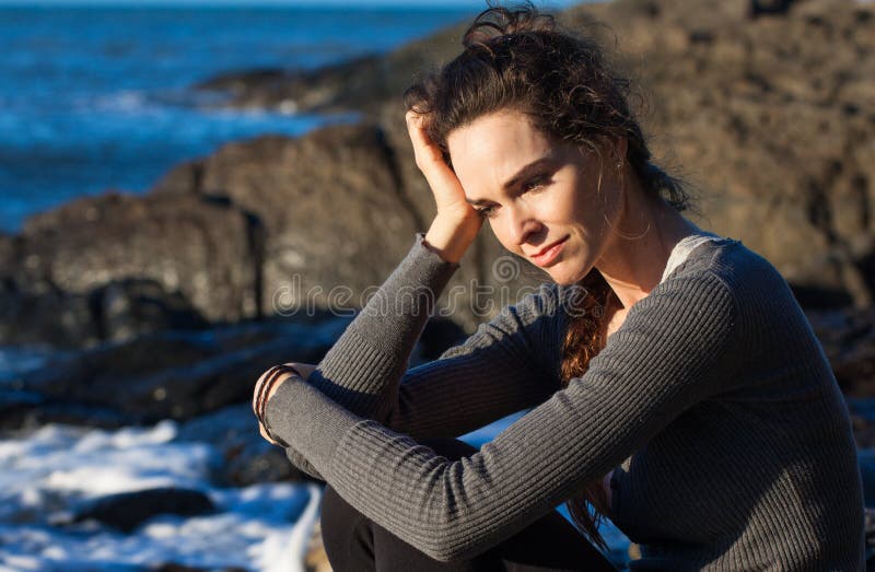 Sad woman deep in thought stock photo. Image of displeased - 34159314