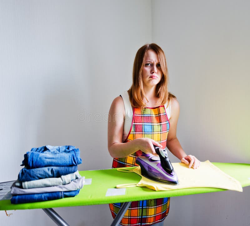 Sad Woman of Doing the Ironing. Stock Photo - Image of laundry, indoors ...