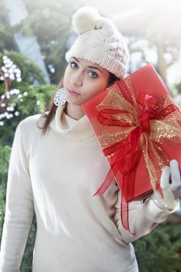 Sad woman with gift box stock image. Image of santa, attractive - 45342113