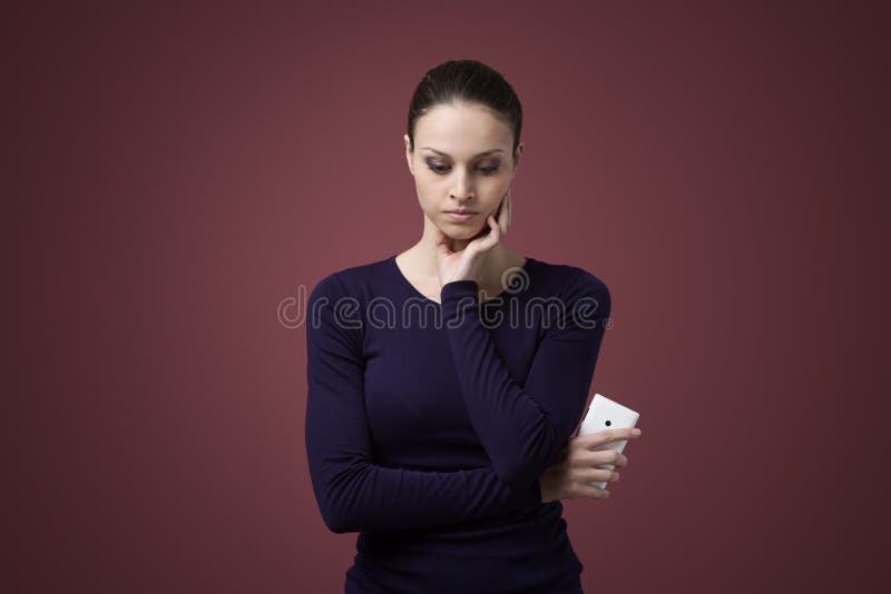 Sad Woman with Mobile Phone Stock Image - Image of pensive, looking ...
