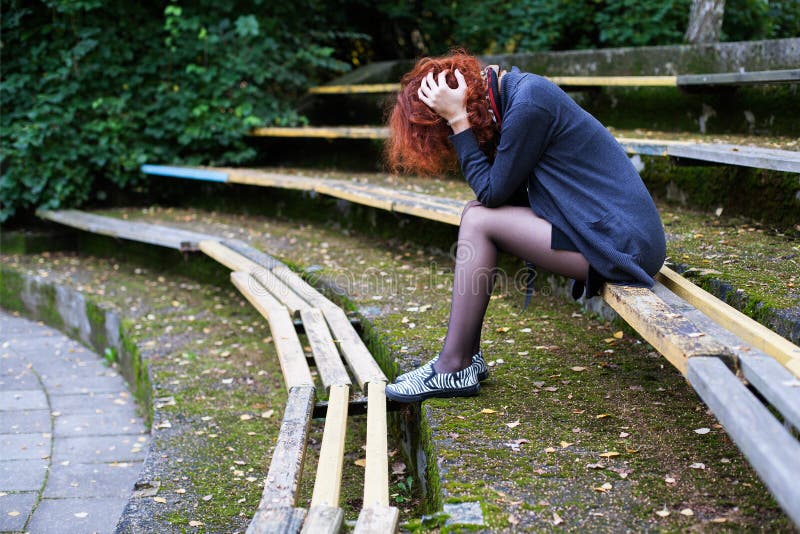 Sad Woman Sitting on the Bench in the Park Stock Photo - Image of ...