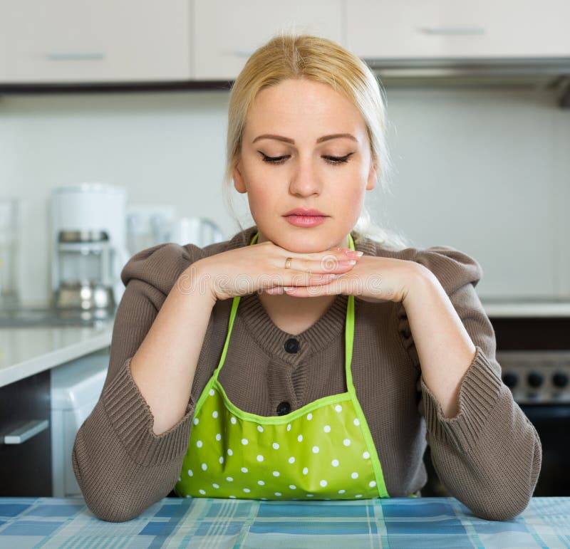 Lonely Blonde Young Female Sitting Sad Table Kitchen Stock Photos ...