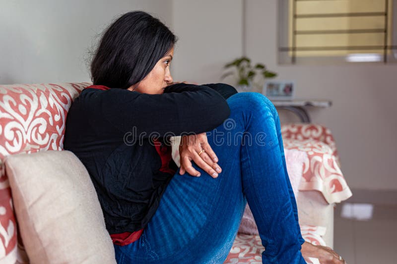 Sad Woman Sitting On Floor Holding Head In Hands Stock Image Image Of