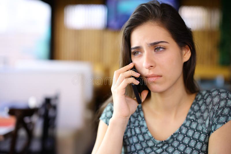 Sad Woman Talking on Phone in a Bar Stock Photo - Image of insecure ...