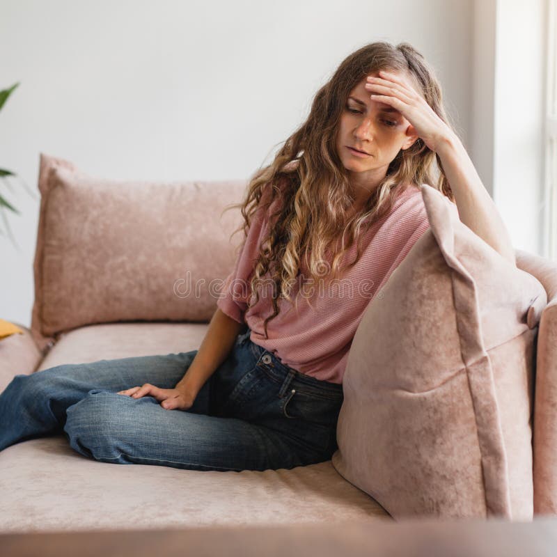 Sad Woman Thinking about Problem, Sitting Alone on Couch Stock Photo ...