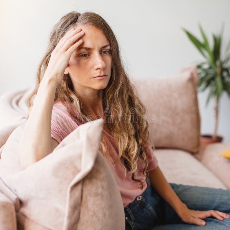 Sad Woman Thinking about Problem, Sitting Alone on Couch Stock Photo ...